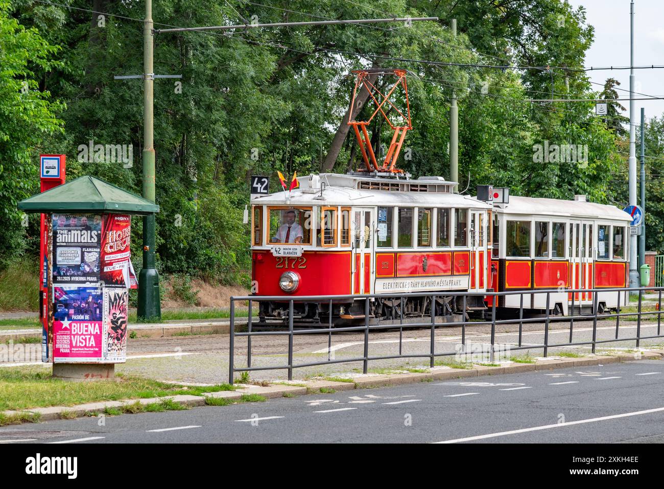 Red vintage retro tram, public transportation in the streets of Prague ...
