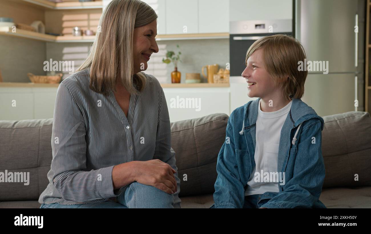 Glad loving senior Caucasian woman mature grandparent hug embrace ...