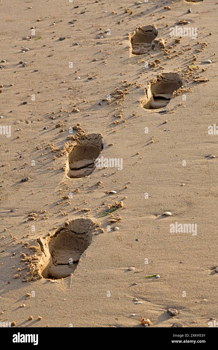 Human footprints sand hi-res stock photography and images - Alamy