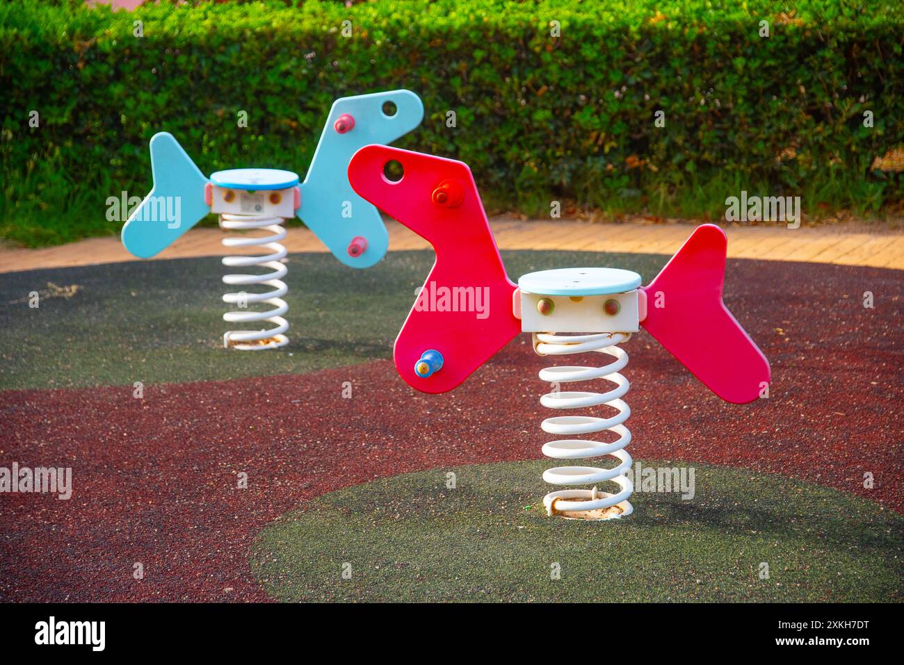Blue swings on empty playground hi-res stock photography and images - Alamy