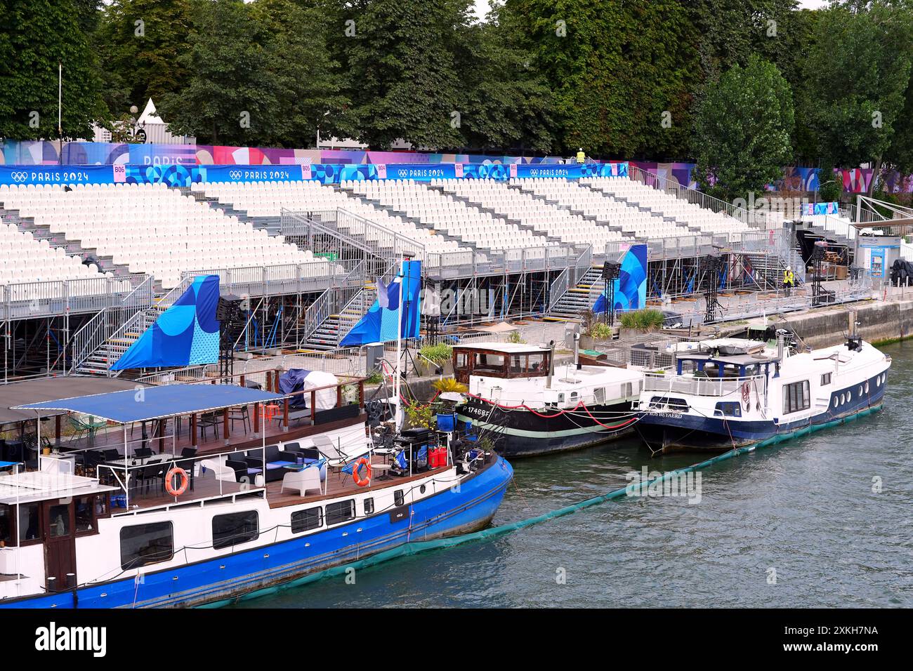Work is completed on seating for the opening ceremony alongside the ...