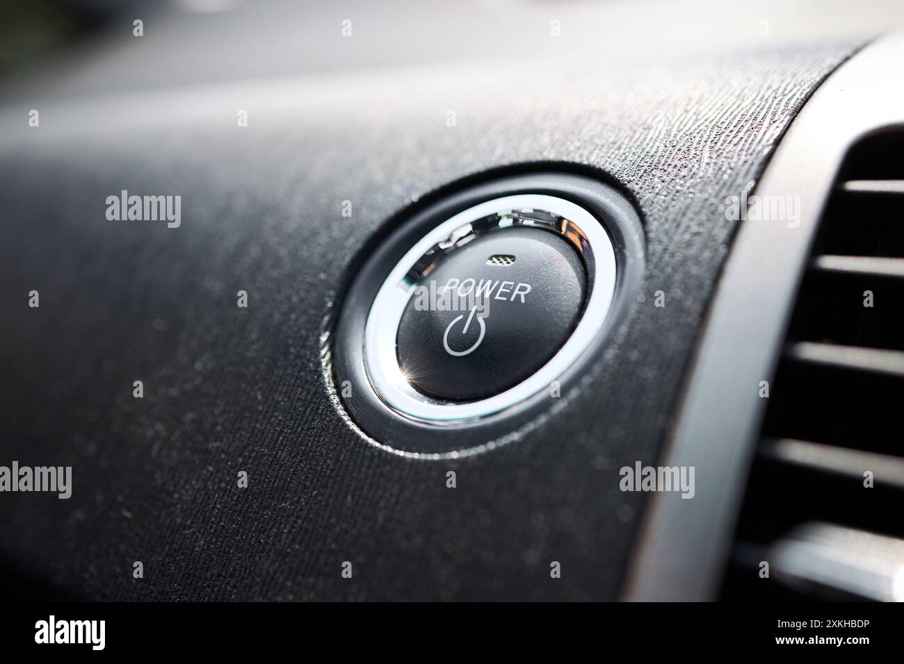 Engine Start Stop power button on modern car. Black leather dashboard ...