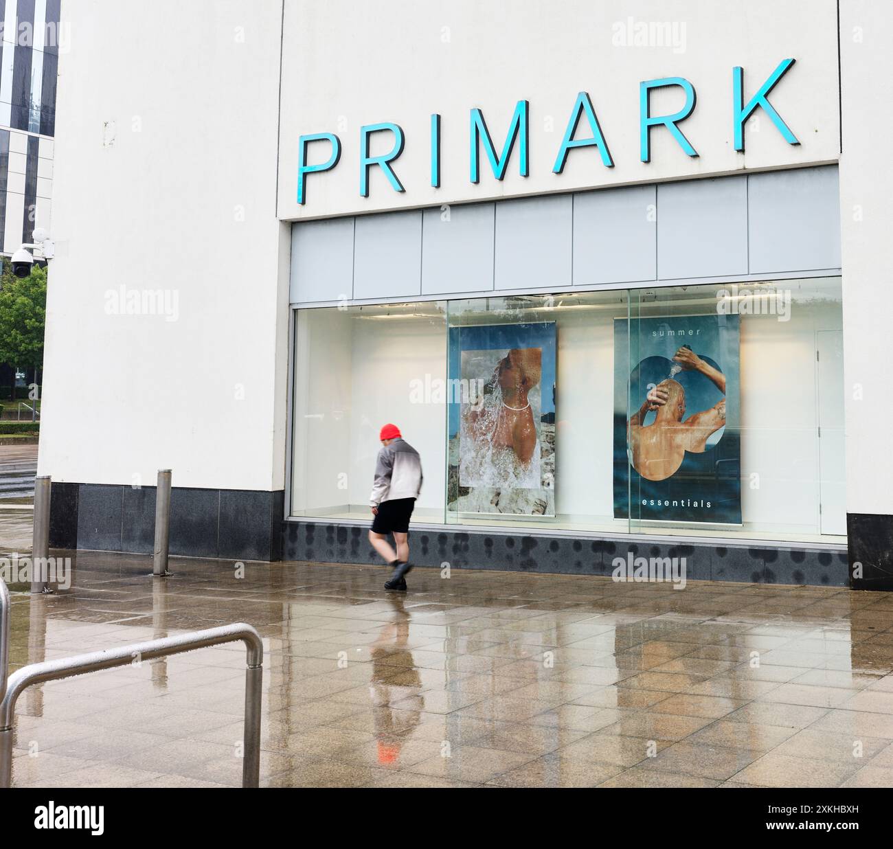 Primark shop on a rainy day in Corby town centre shopping complex and ...
