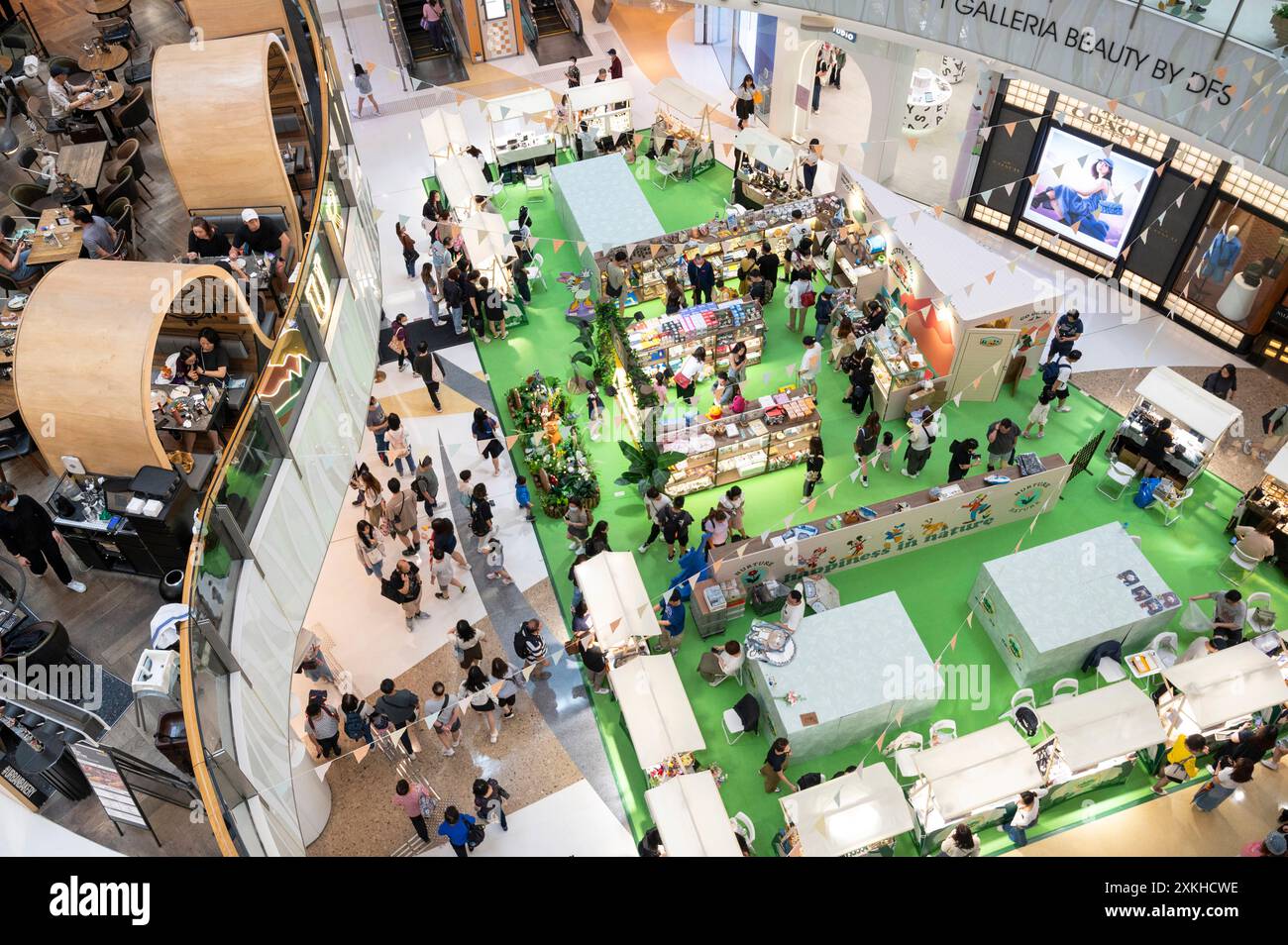 People are seen walking around the restaurant while attending an ...