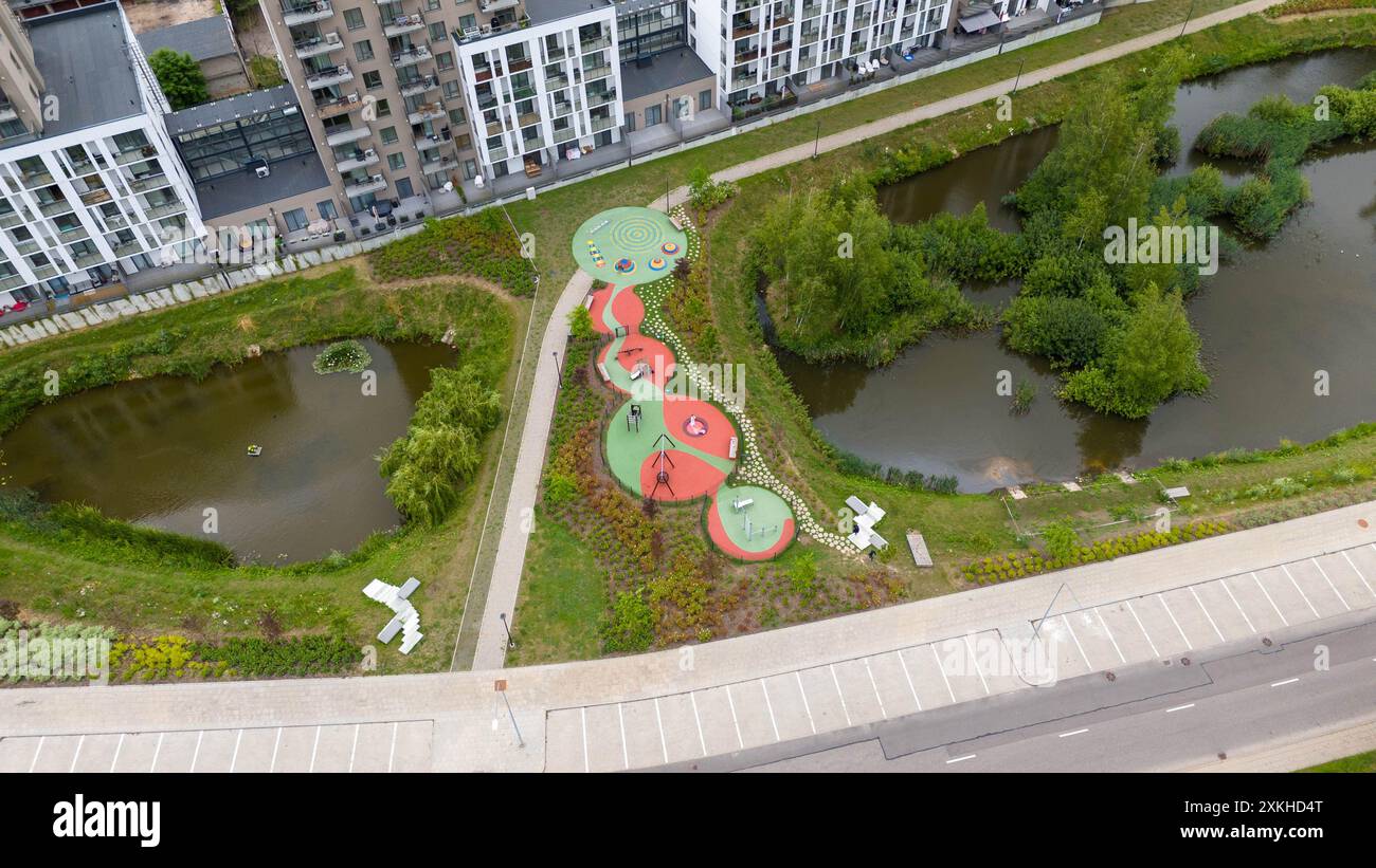 Drone photography of a children playground at lakefront during cloudy ...