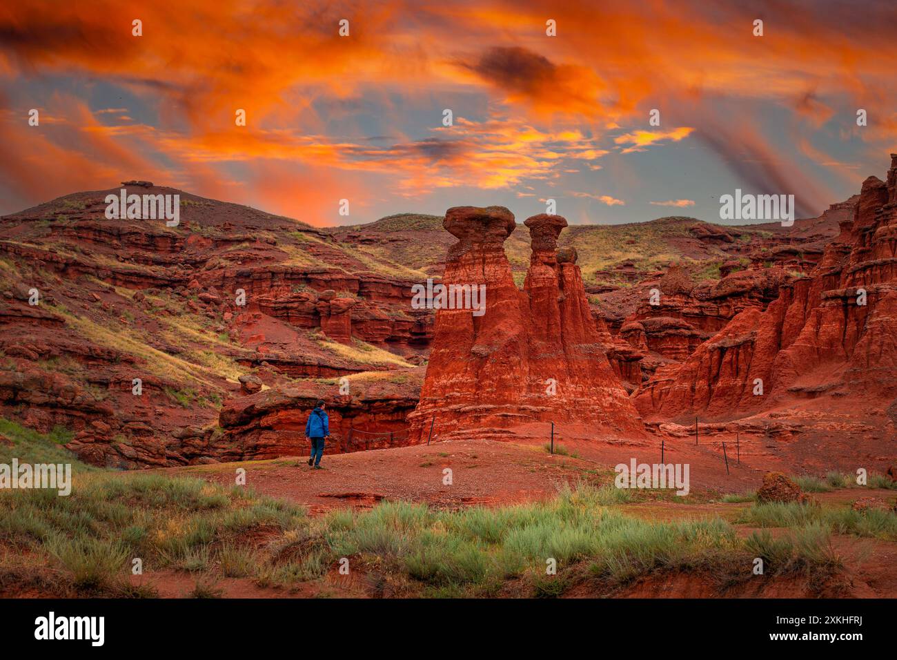 Red fairy chimneys shaped like formations that are millions of years ...