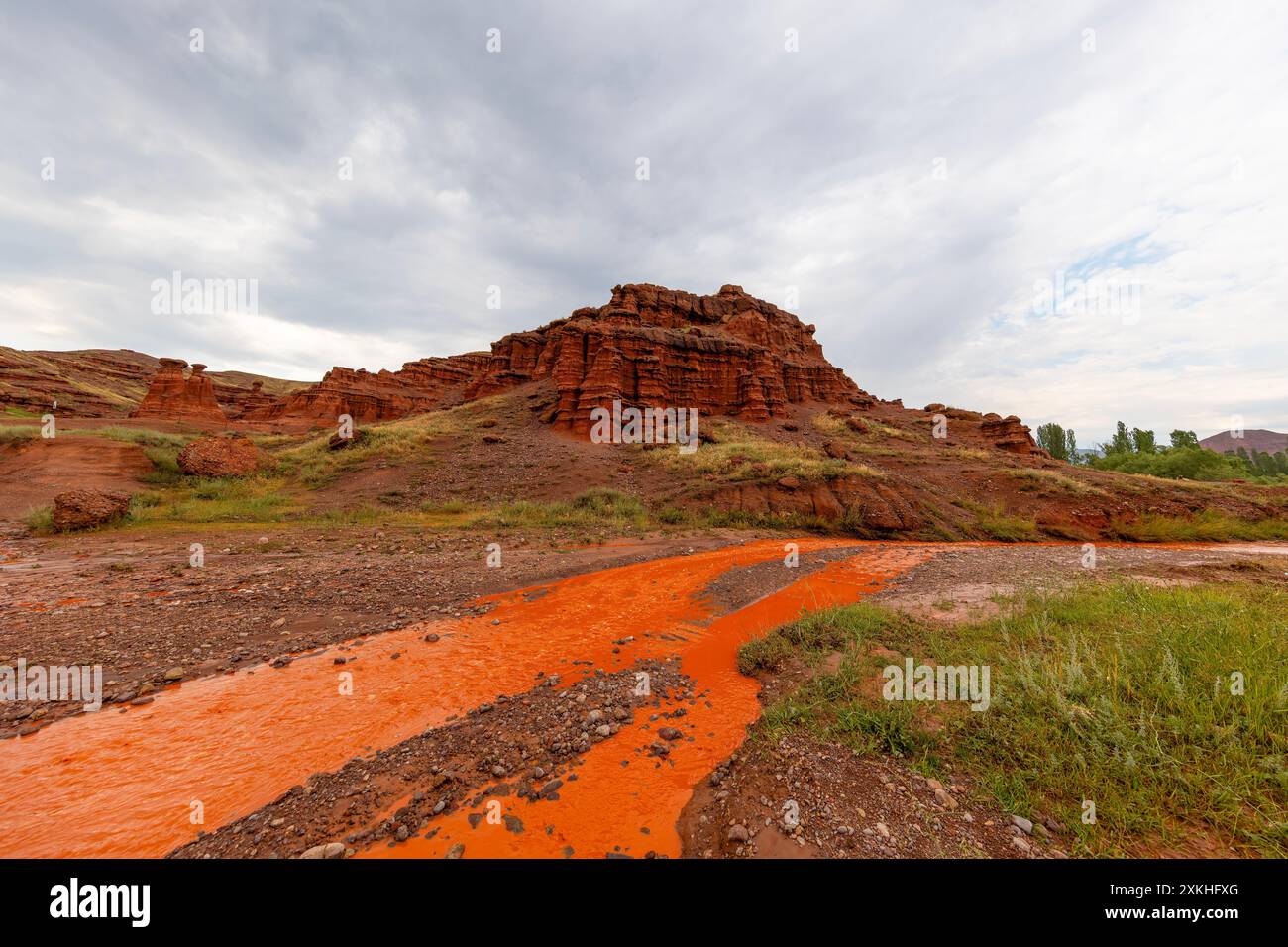 Red fairy chimneys shaped like formations that are millions of years ...