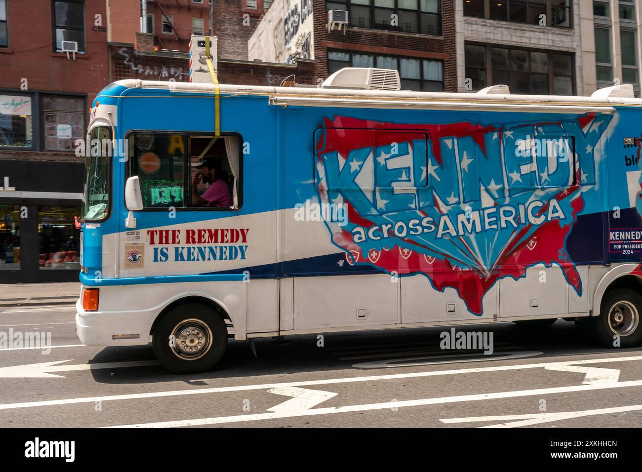 A recreational vehicle plastered with advertising promoting fundraising ...