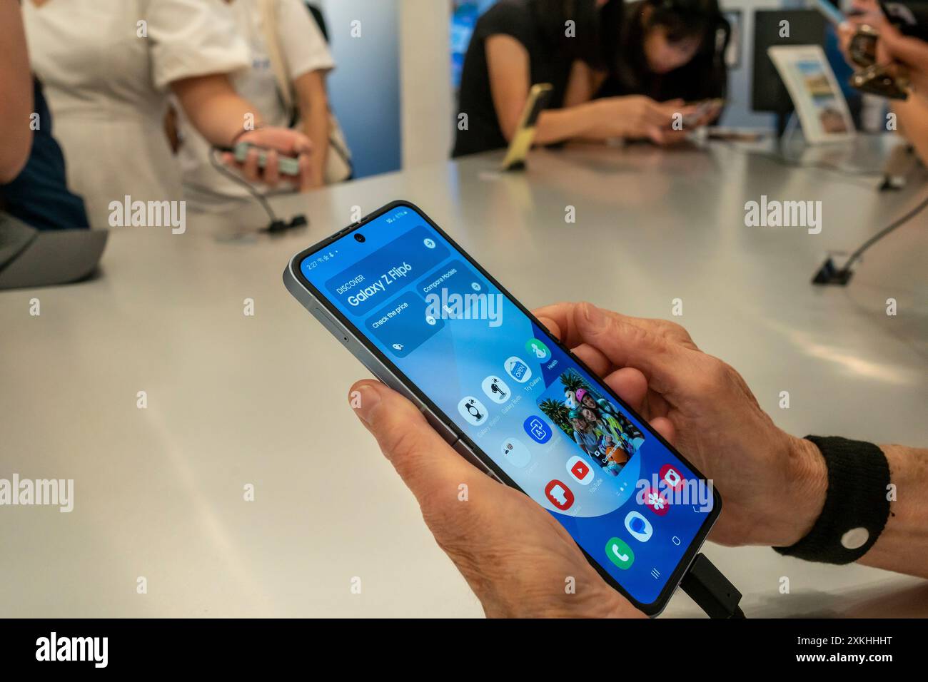 Visitors to the Samsung Galaxy pop-up event in Soho in New York admire ...
