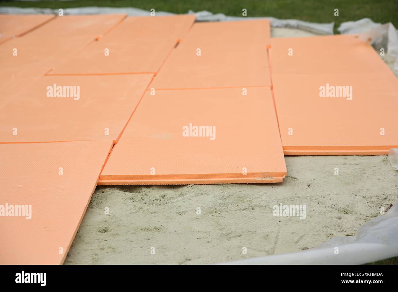 Under pool foam tiles on in backyard Stock Photo - Alamy