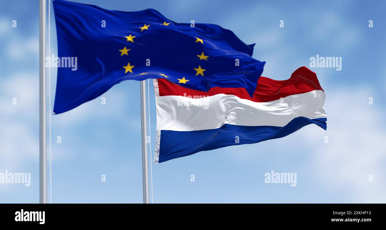 Flags of the Netherlands and the European Union waving in the wind on a ...