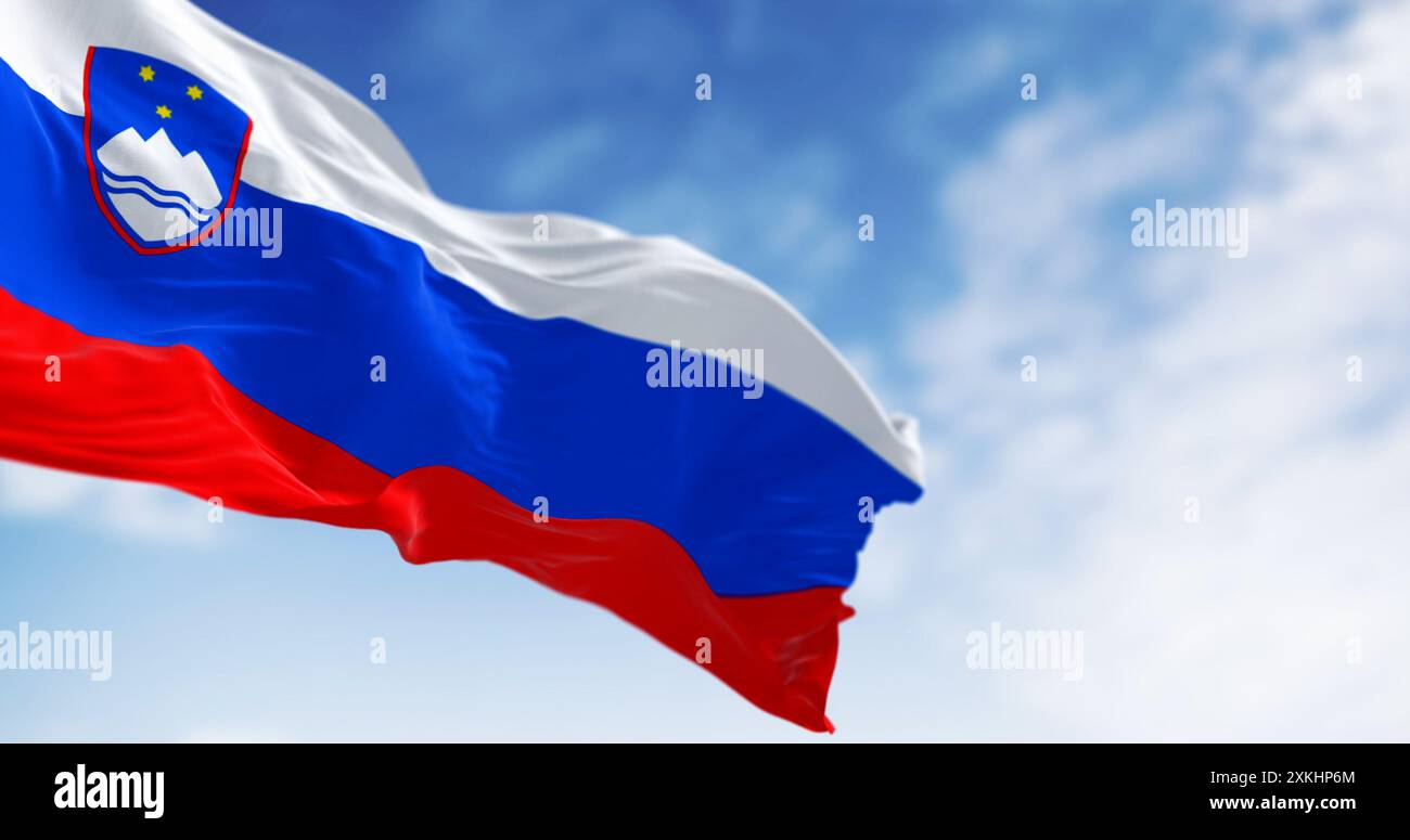 Close-up of Slovenia national flag waving in the wind. Three equal ...