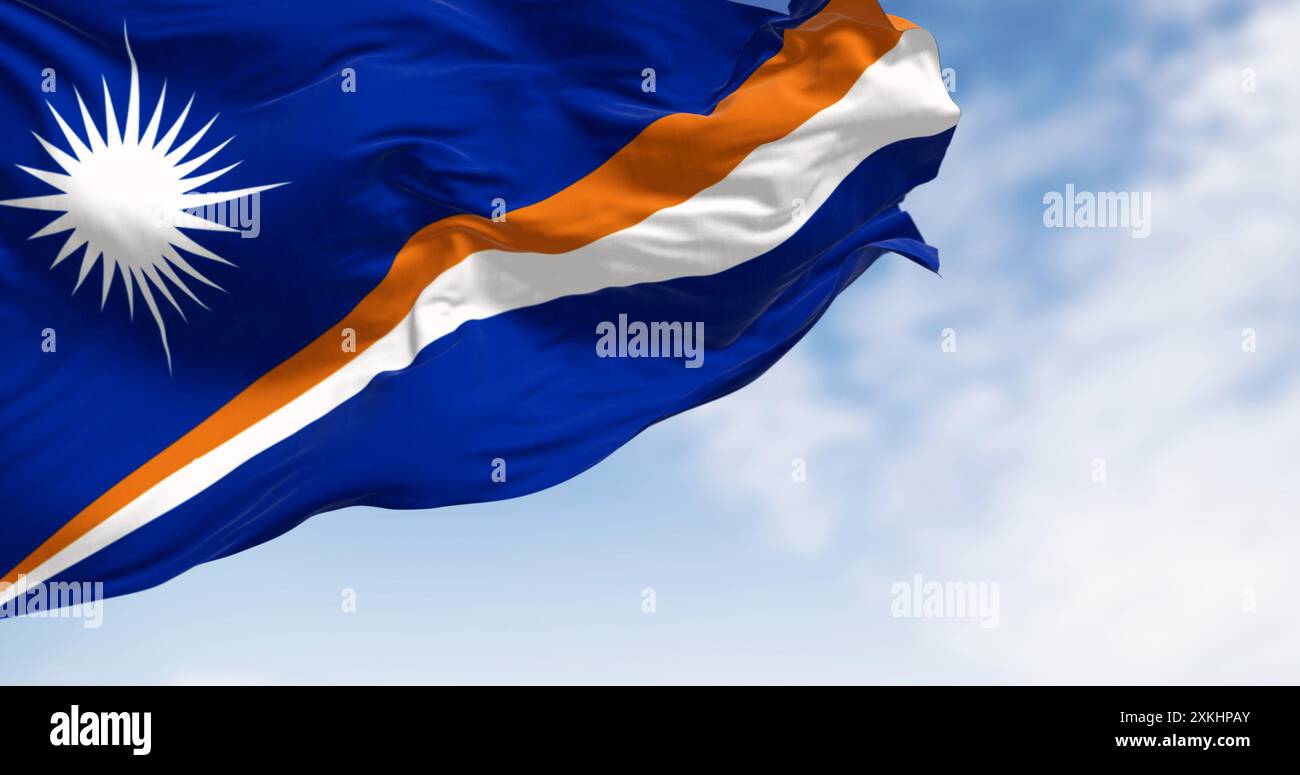National flag of Marshall Islands waving in the wind on a clear day ...