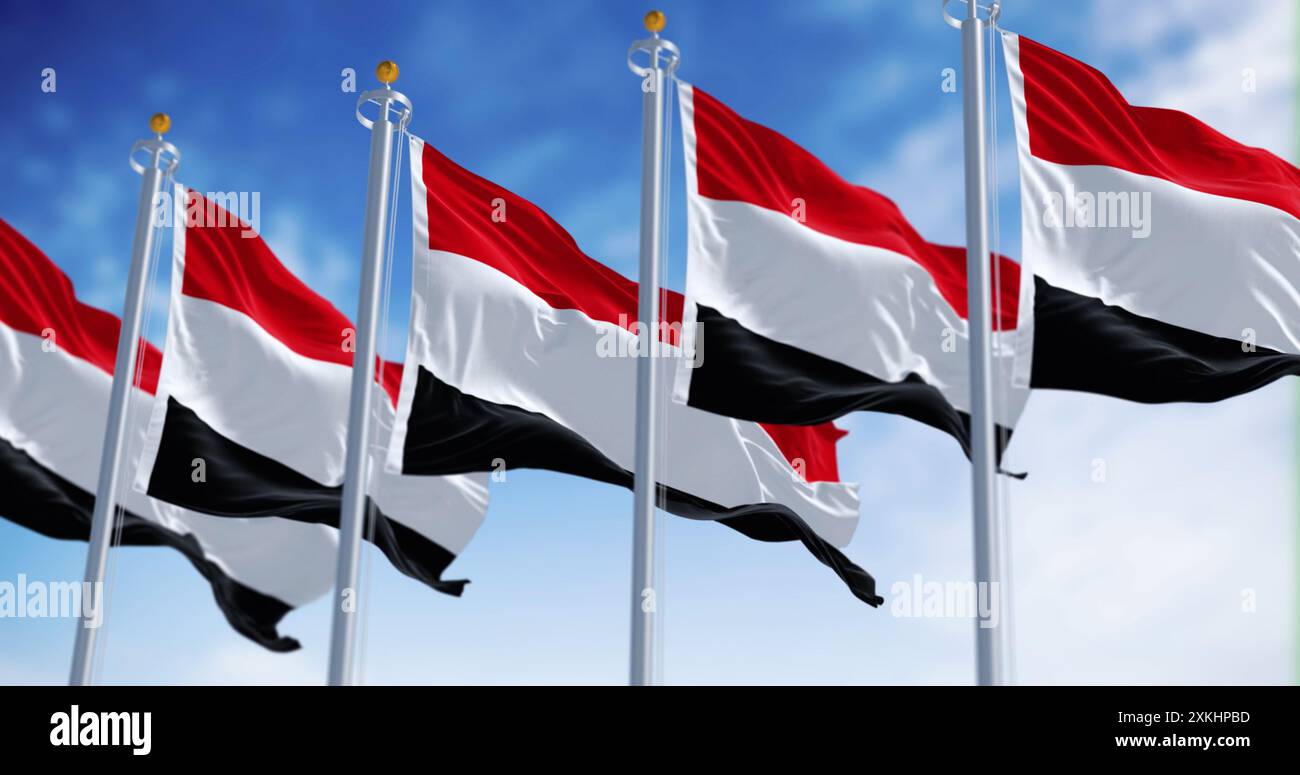 Yemen national flags waving on a clear day. Striped flag, red, white, and black. 3D illustration ...