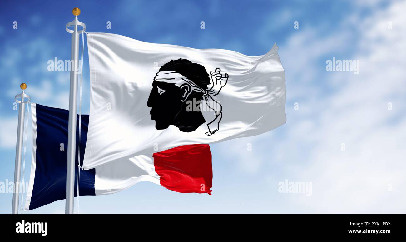 Flag of Corsica waving with national french flag on a clear day. Black ...