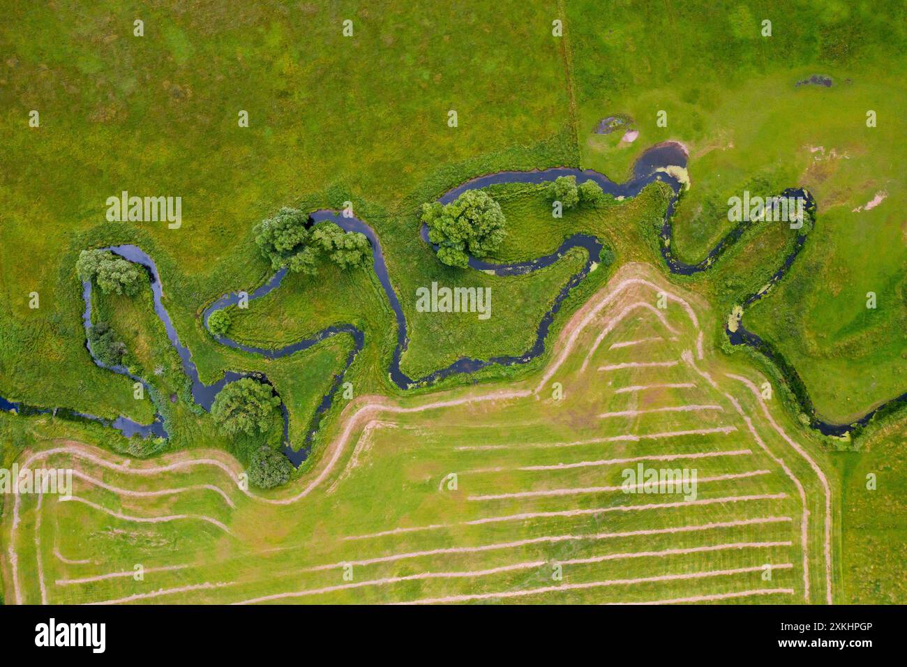 Aerial view over meander belt in meandering Klingavälsån river ...