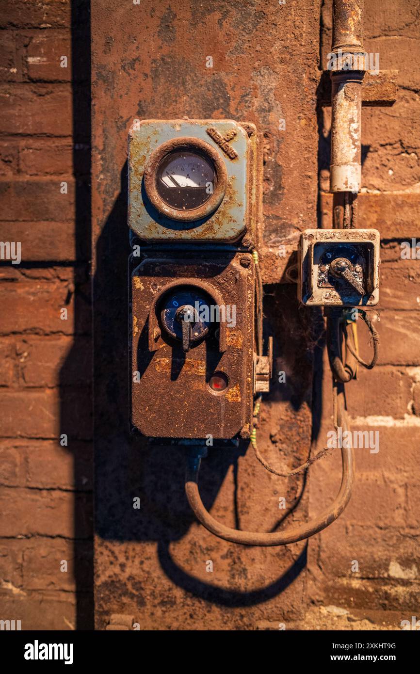 Old electrical plugs and switches in an industrial building Stock Photo ...