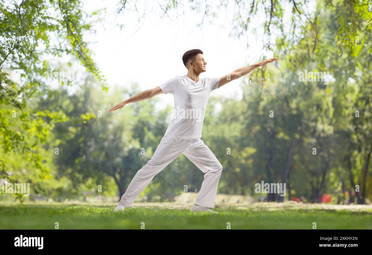 Man practicing tree pose hi-res stock photography and images - Alamy