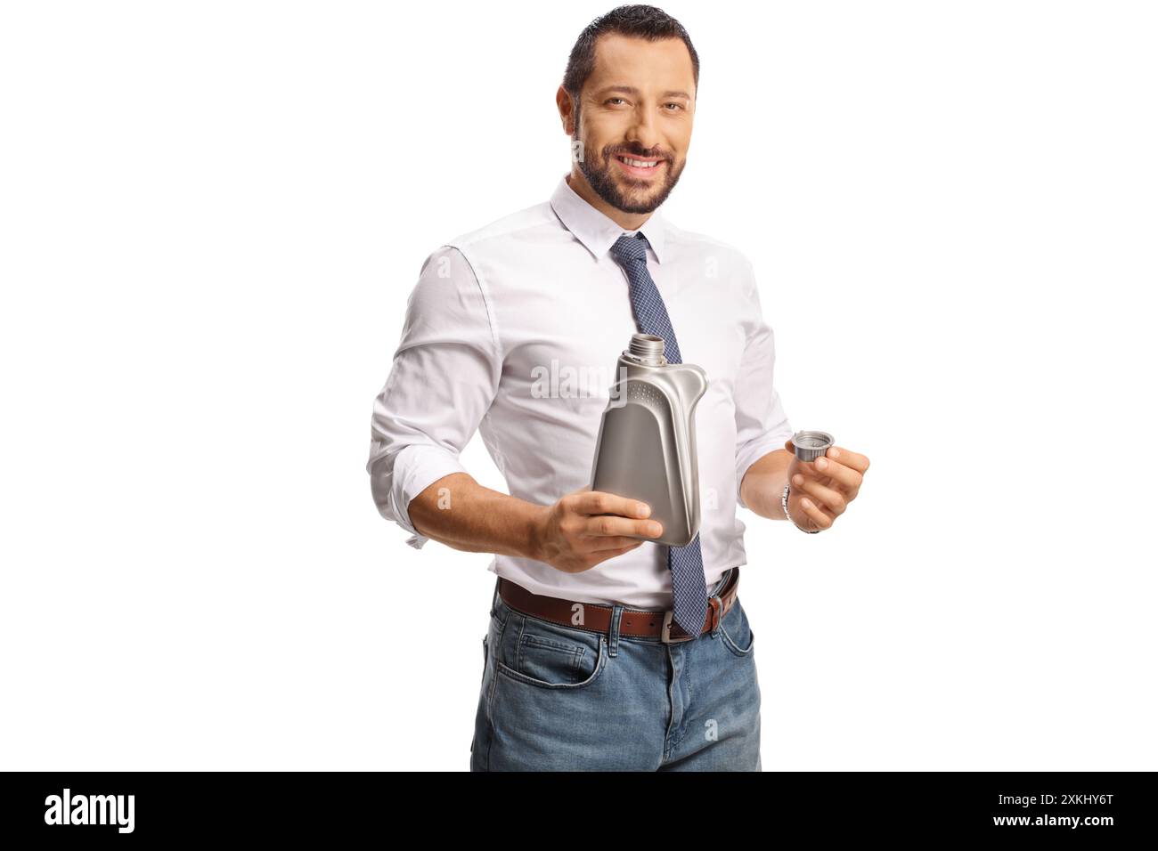 Man holding engine oil bottle and smiling isolated on white background ...