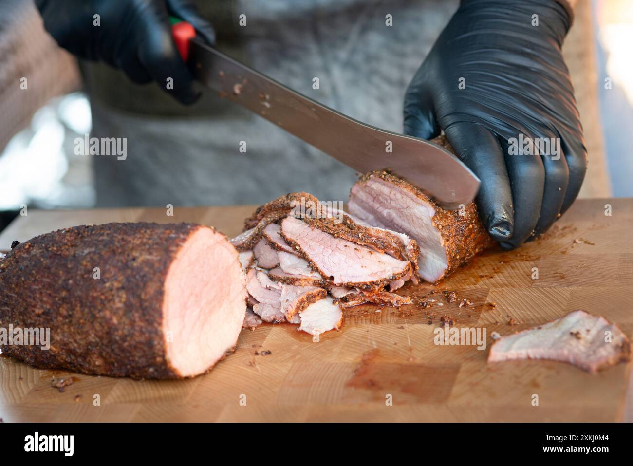 Chef slicing grilled barbecue hi-res stock photography and images - Alamy