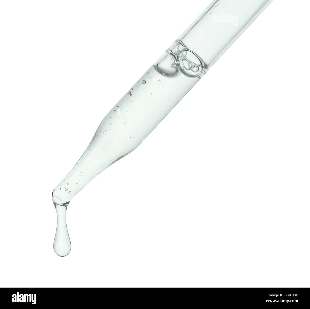 Dripping cosmetic serum from pipette isolated on white Stock Photo - Alamy