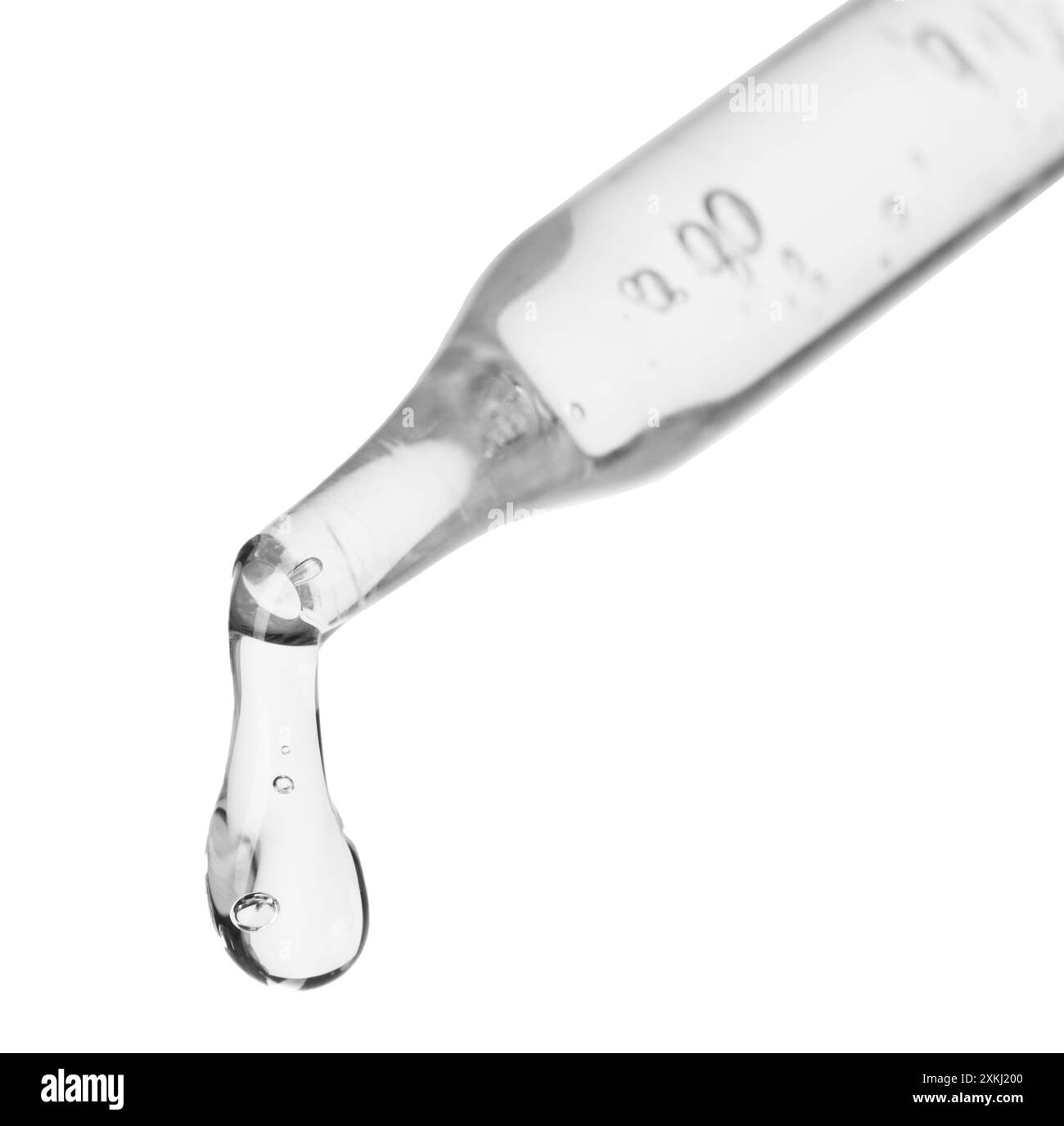 Dripping cosmetic serum from pipette on white background Stock Photo ...