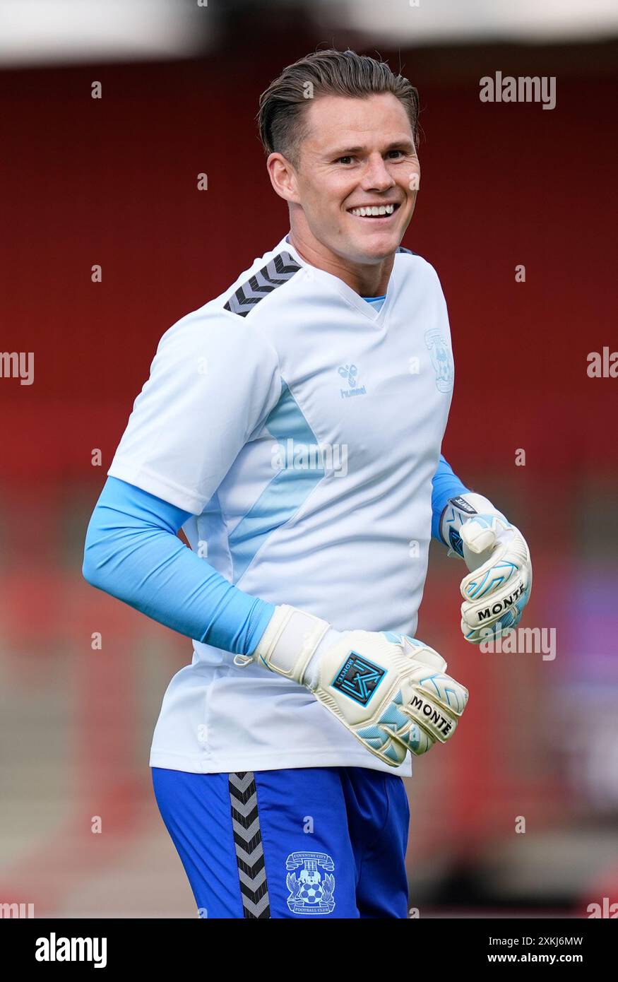 Coventry City goalkeeper Ben Wilson warms up before the pre-season ...
