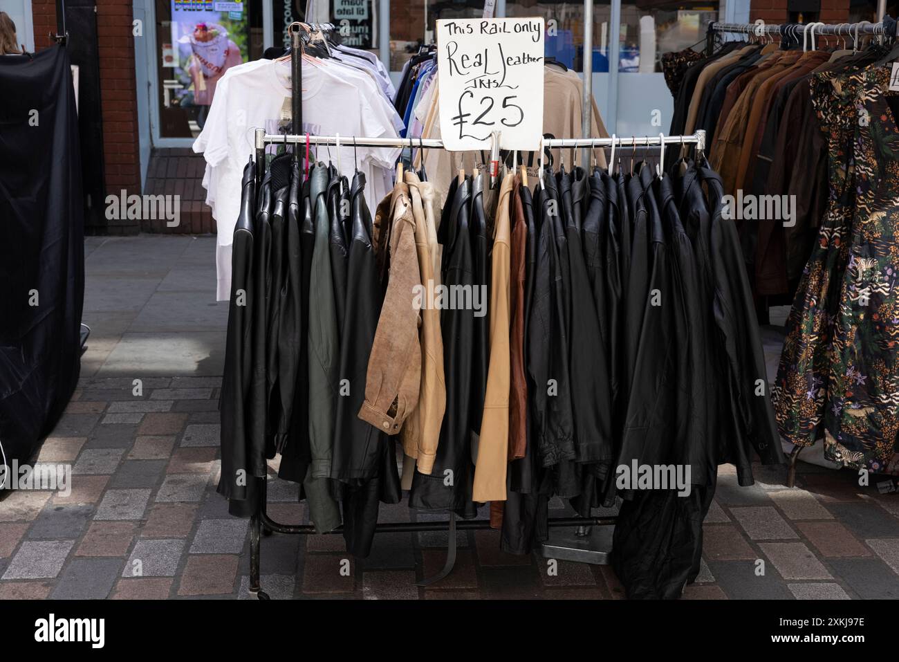 Real leather jackets hanging on a clothes rail at a market stall for ...
