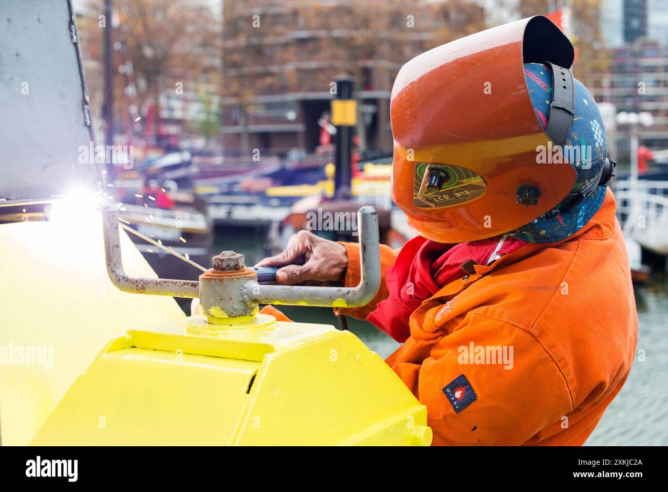 Welder Welding in Marine Museum Craftman Marine Welder welding the base ...