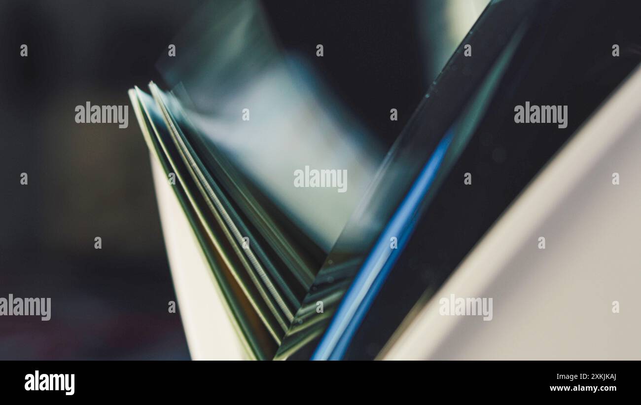 Money counting machine counts hundred dollar banknotes for currency ...