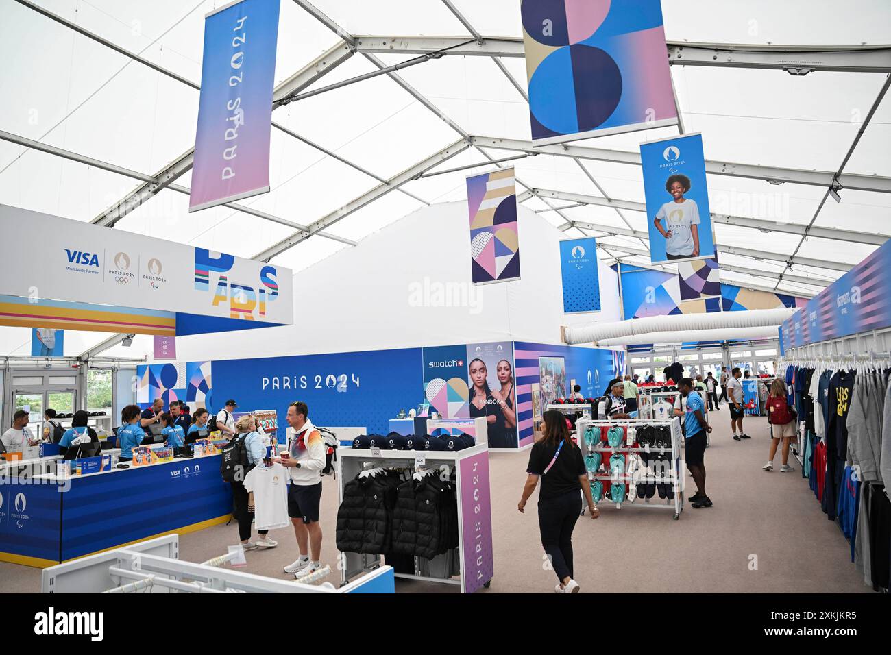 Paris, France. 23rd July, 2024. People select souvenirs at an official ...