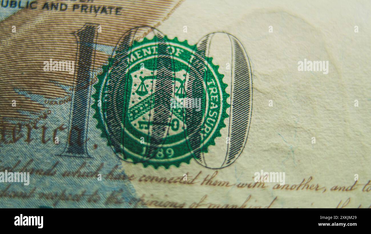 Process of examining authenticity of hundred dollar bill for currency ...