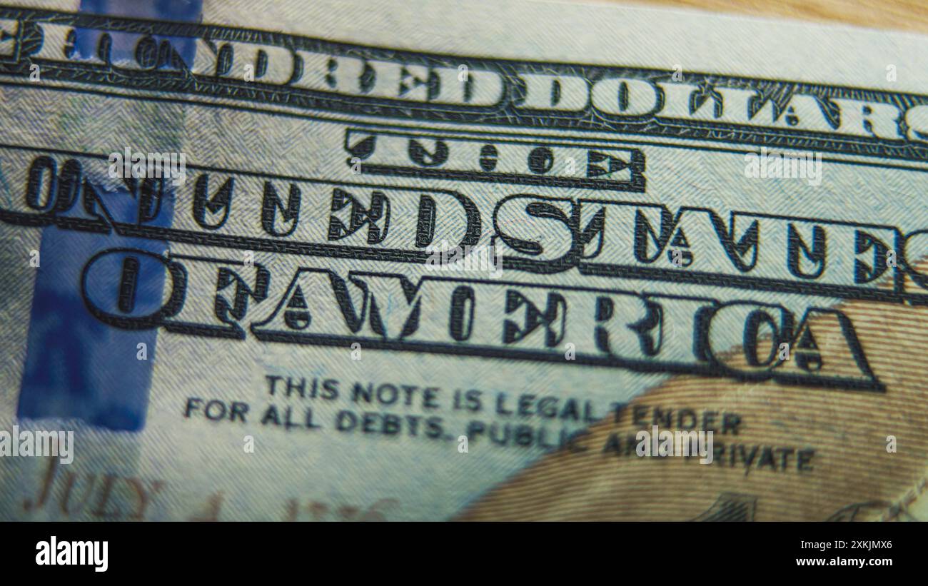 Process of examining authenticity of hundred dollar bill for currency ...