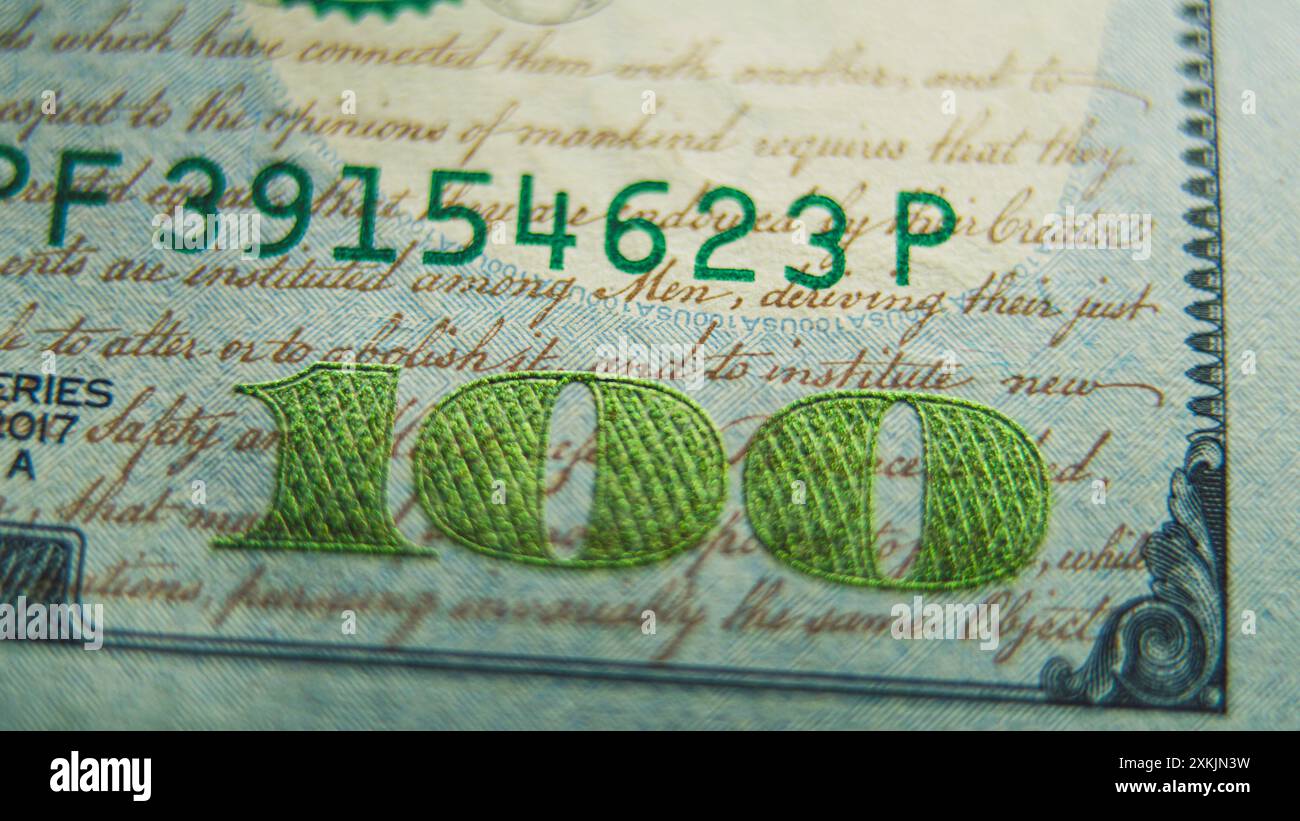 Process of examining authenticity of hundred dollar bill for currency ...