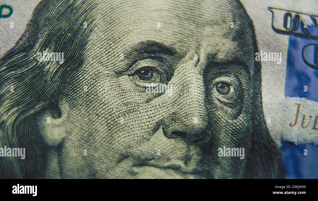 Process of examining authenticity of hundred dollar bill for currency ...