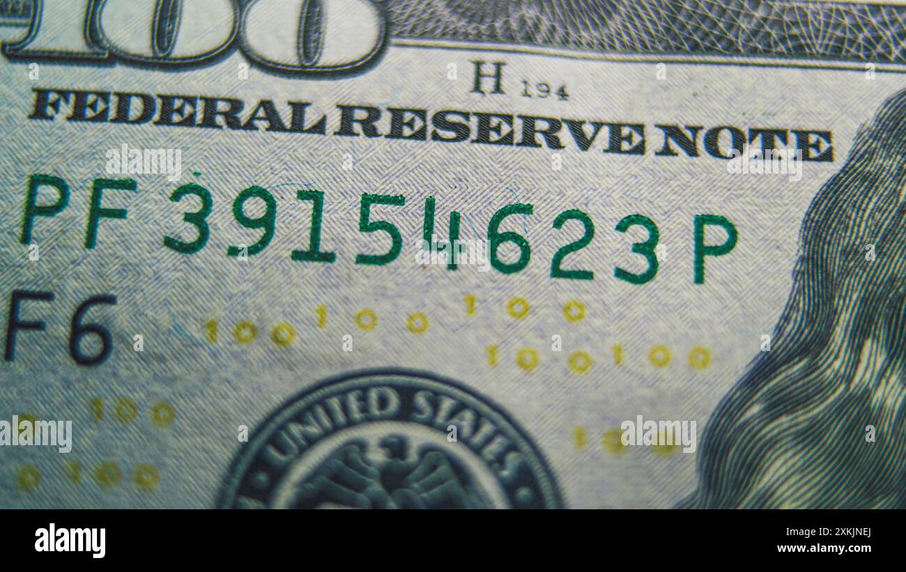 Process of examining authenticity of hundred dollar bill for currency ...