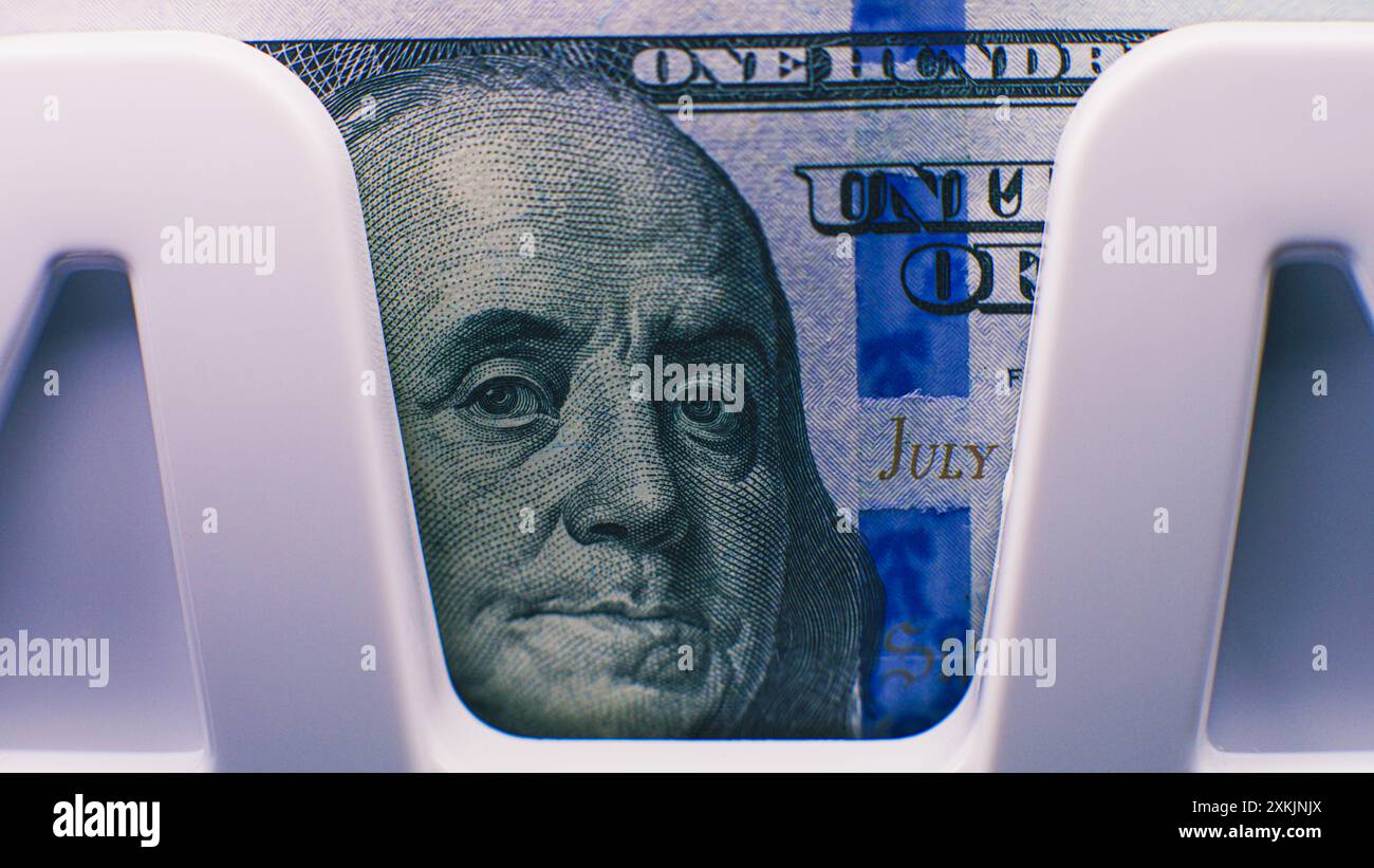 Cash counting machine counts hundred dollar bills for currency exchange ...