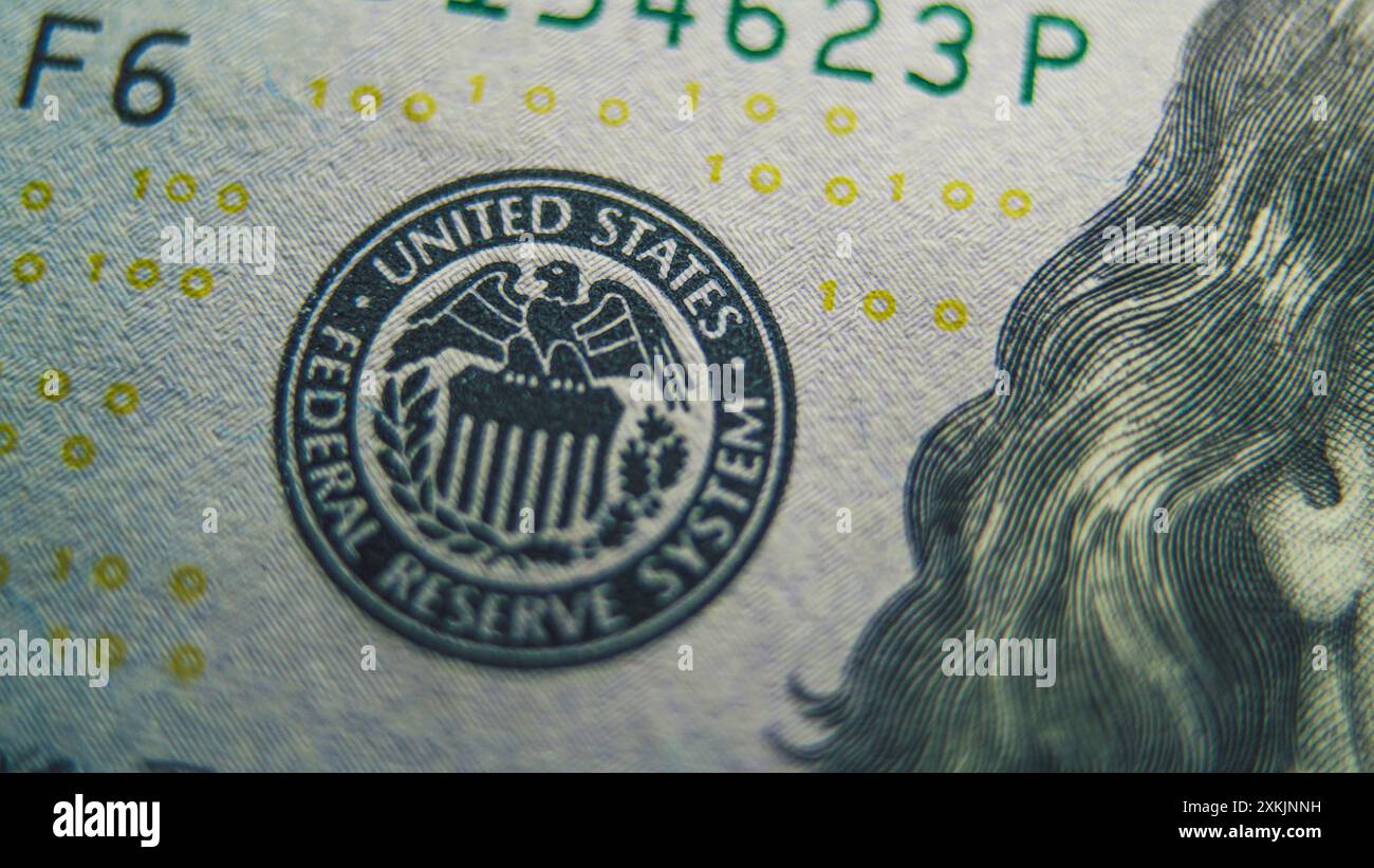 Process of examining authenticity of hundred dollar bill for currency ...