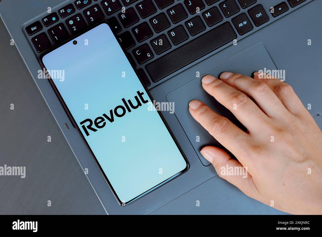 In this photo illustration, the Revolut logo is displayed on a ...