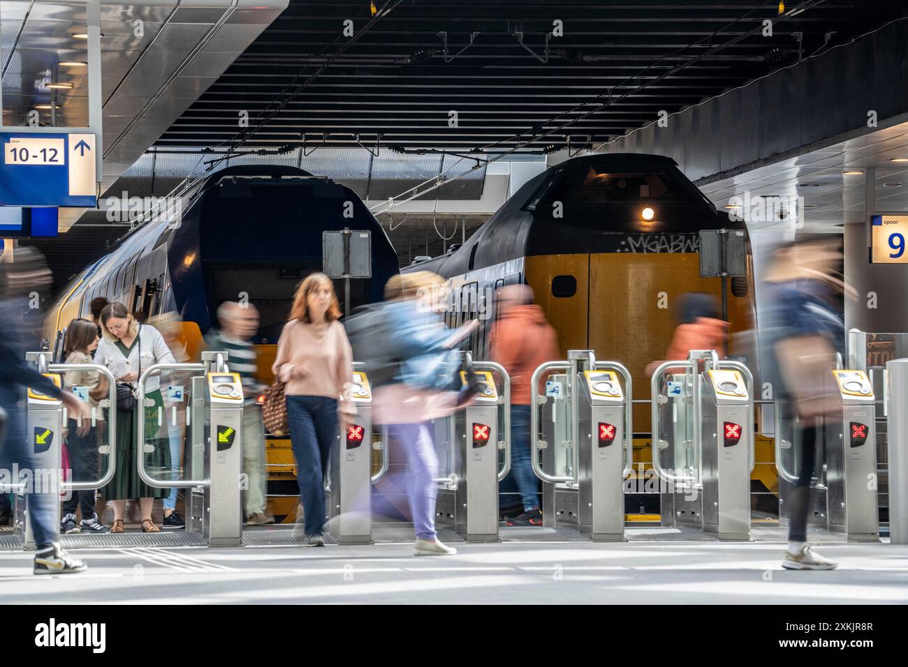 Station concourse, automatic entrance and ticket control in front of ...