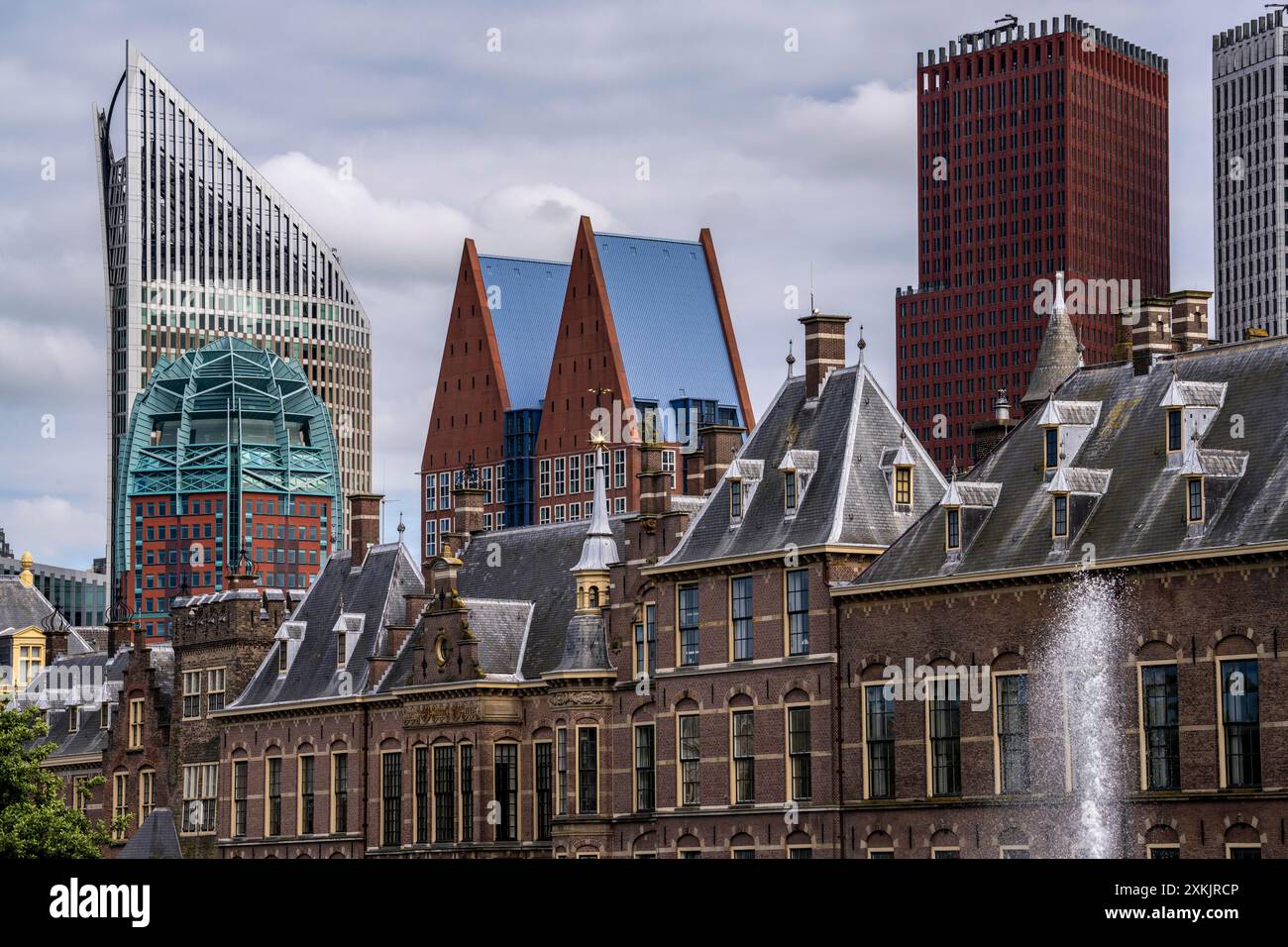 The historic Binnenhof, seat of the Dutch government, Hofvijver pond ...