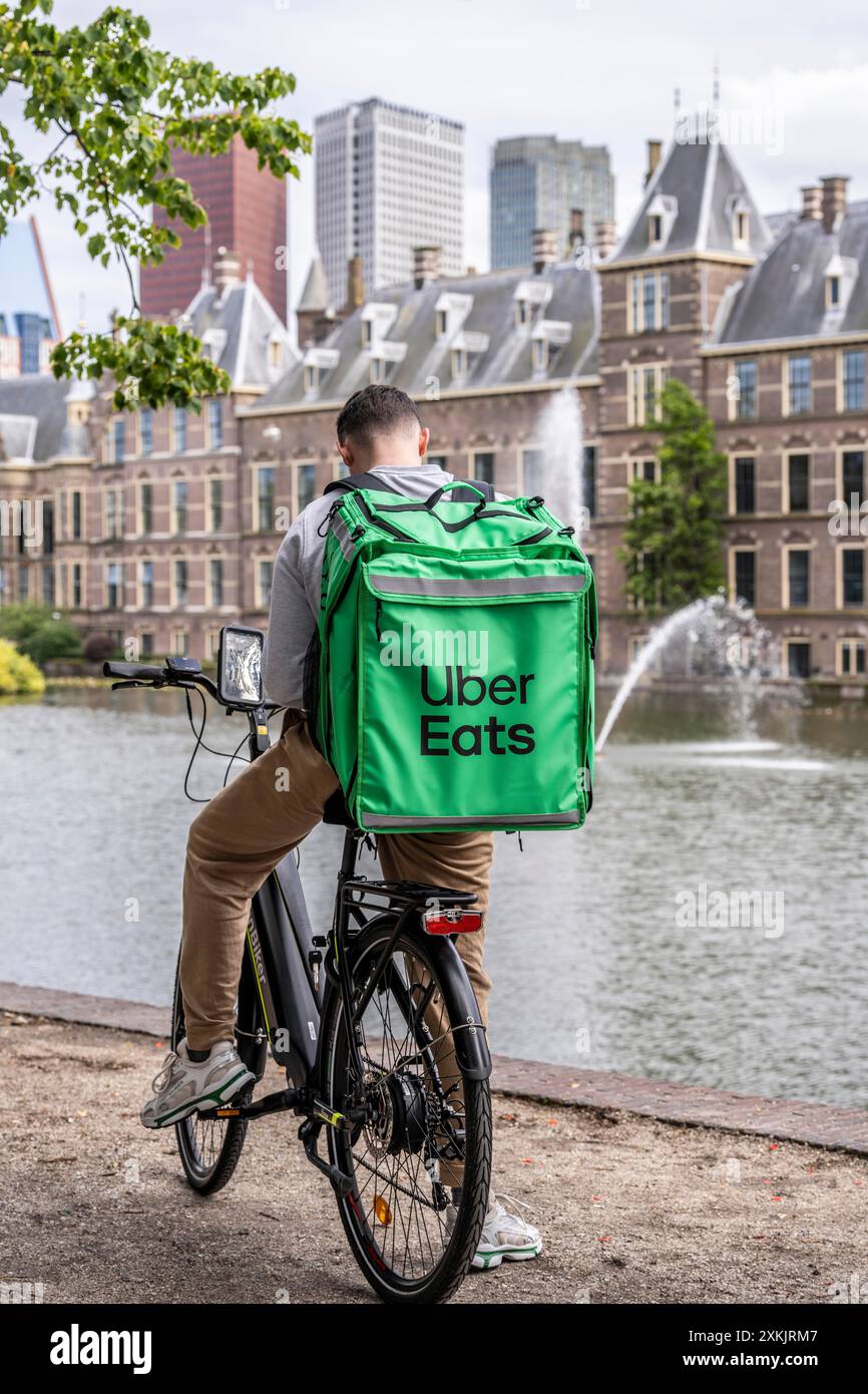 Uber Eats delivery service, delivery driver taking a break, at the ...