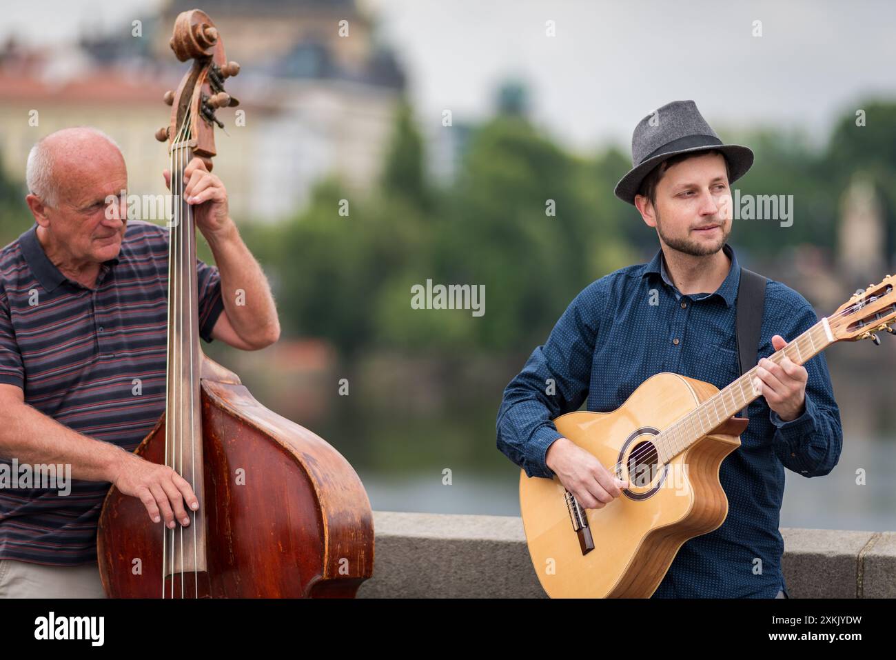 Street musicians playing on the Charles bridge in Prague, capital of ...