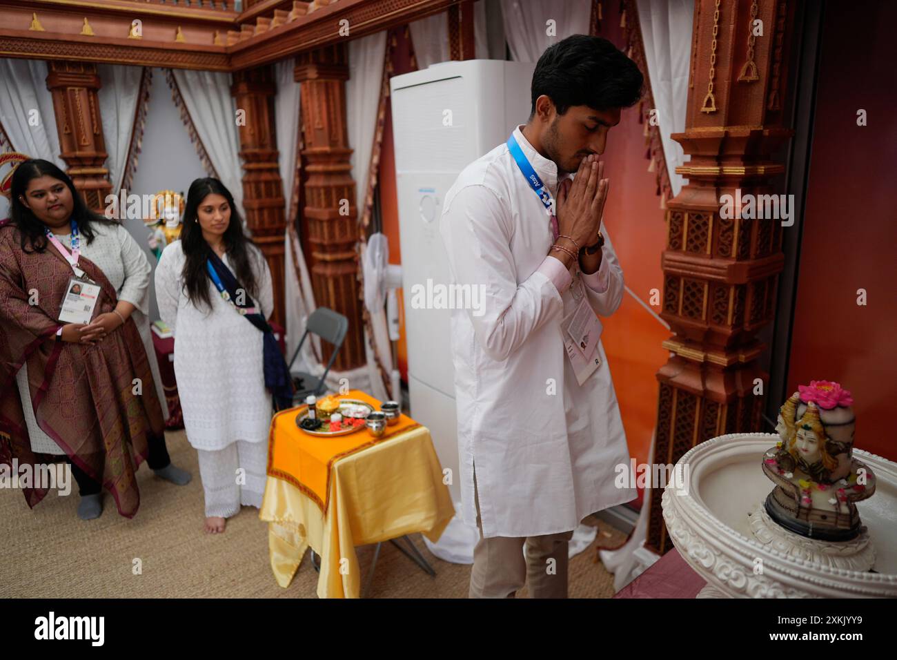 Hindu religious representative Pavitra Patel prays inside the Hindu ...