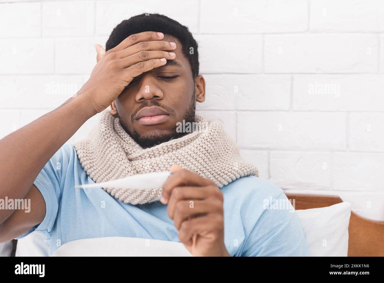 African american guy holding sore hi-res stock photography and images ...