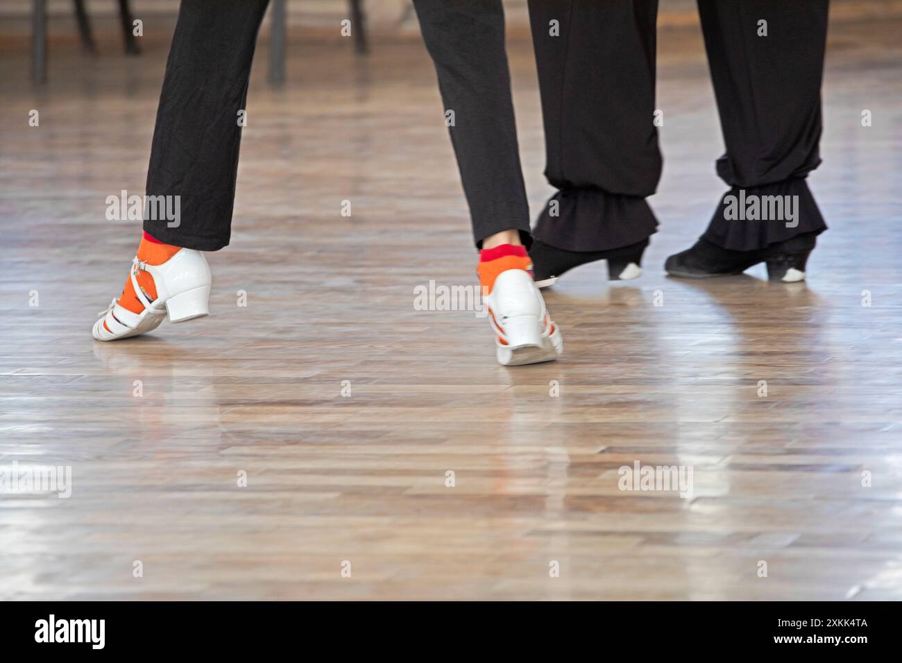 girl is training with a teacher to dance a standard program in ballroom ...