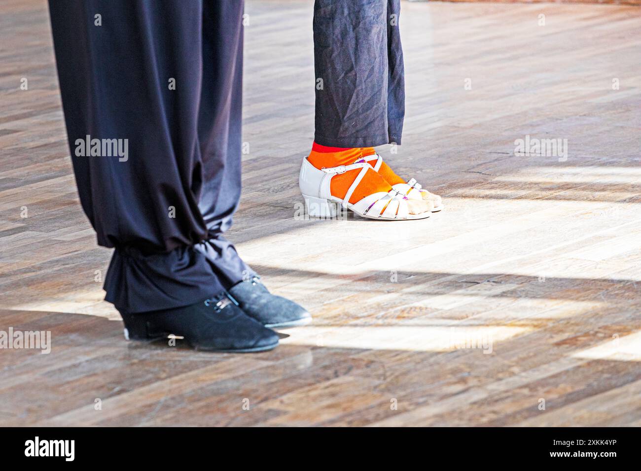 girl is training with a teacher to dance a standard program in ballroom ...