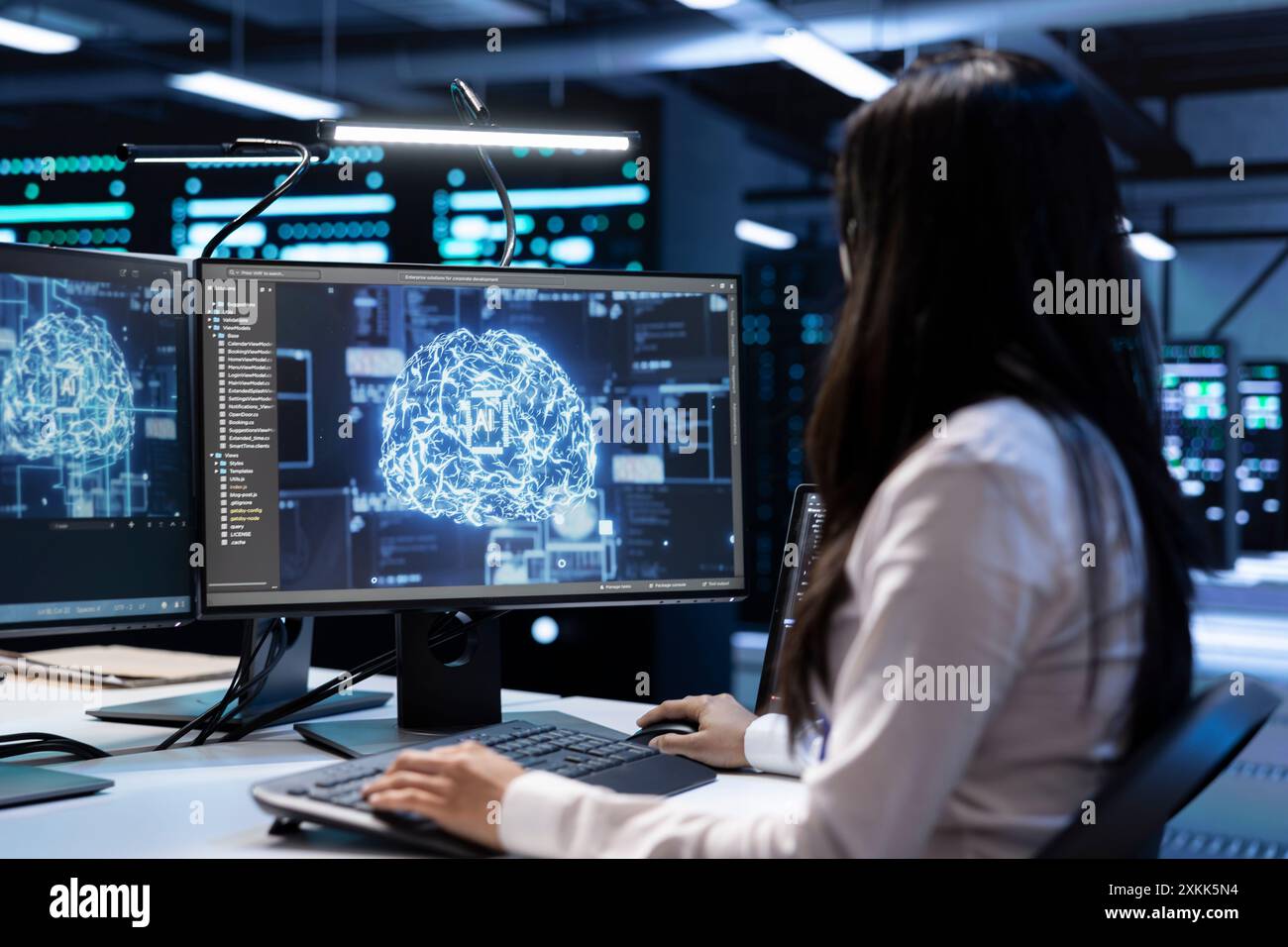 Engineer working in data center providing computing resources needed for artificial intelligence ...