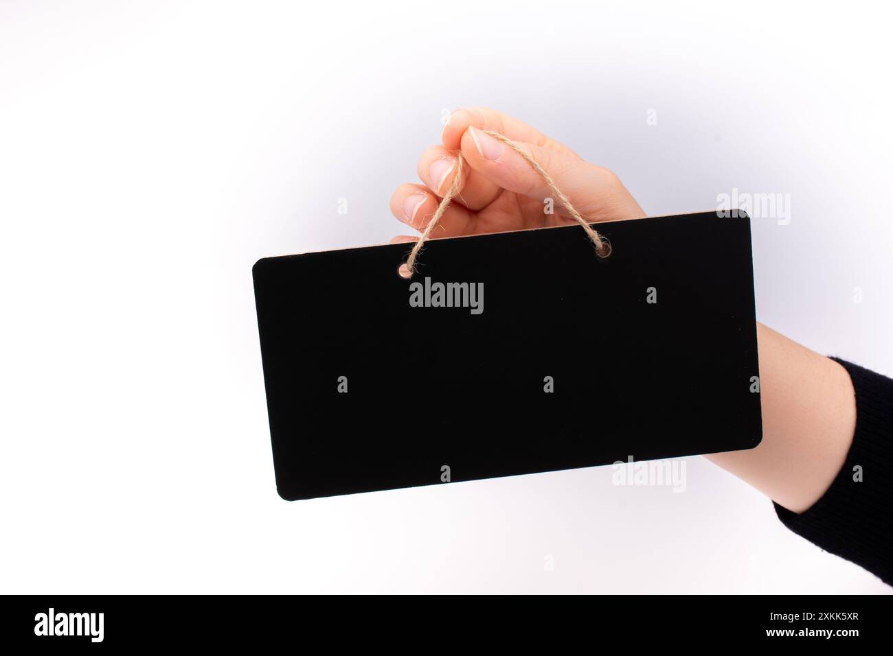 Rectangular shaped black notice board in hand on white background Stock ...