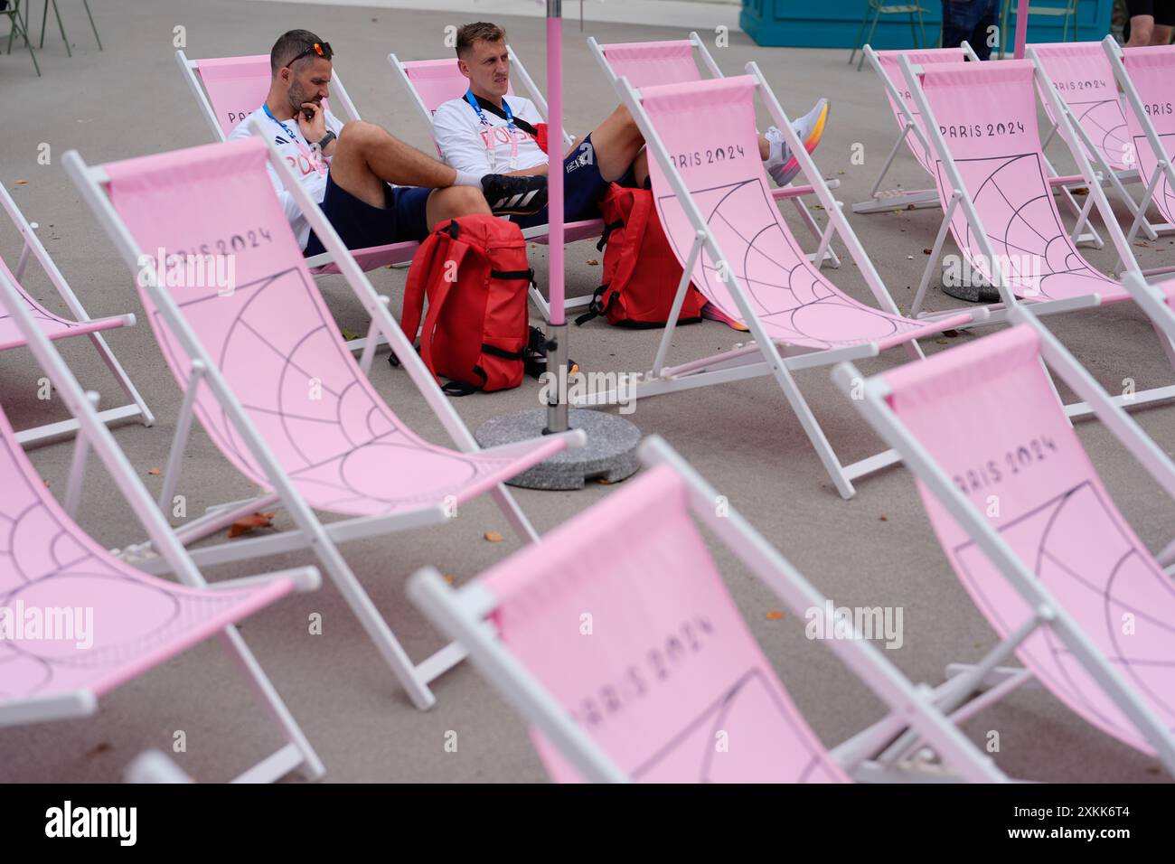 Members of the Polish team lounge inside the Olympic Village, at the ...